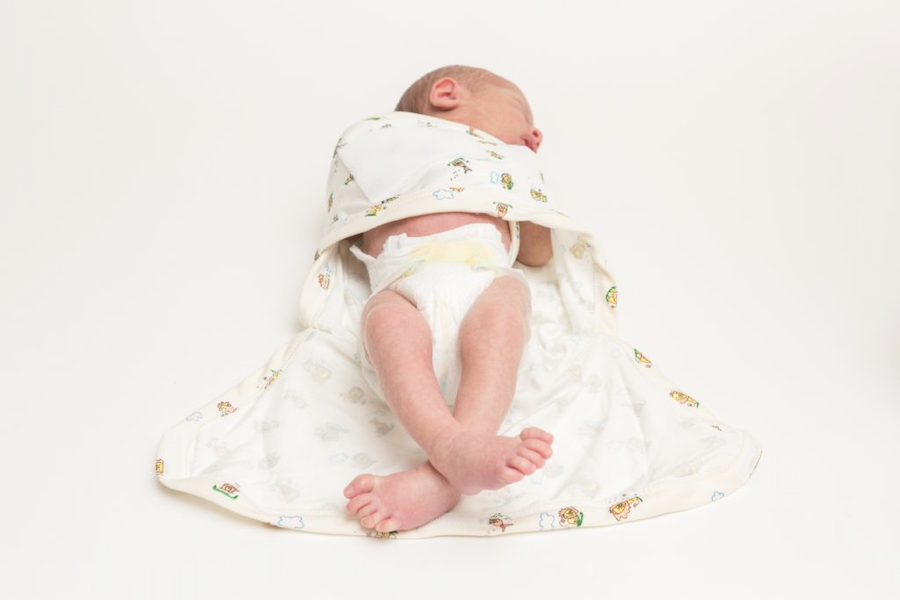 Dandle Wrap Strech - Posicionador de faixas dinâmicas para bebês.